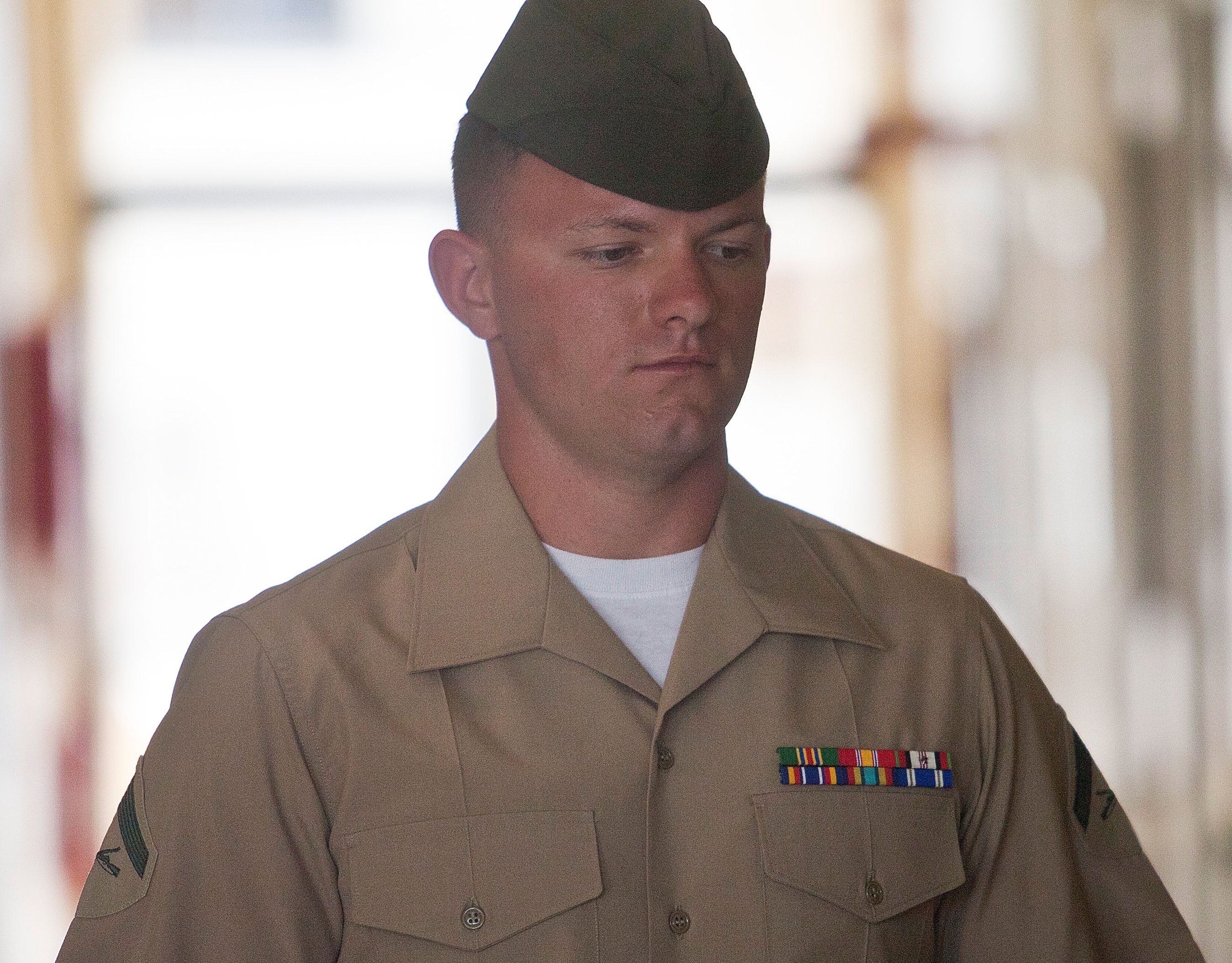 Marine sentenced to 30 days in jail, reduced rank, in alleged hazing ...