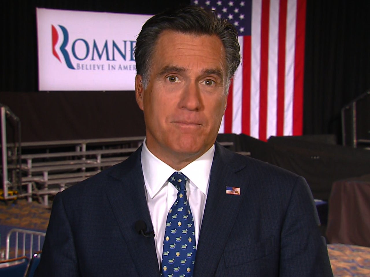 Romney tries to explain remark about "very poor" - CBS News