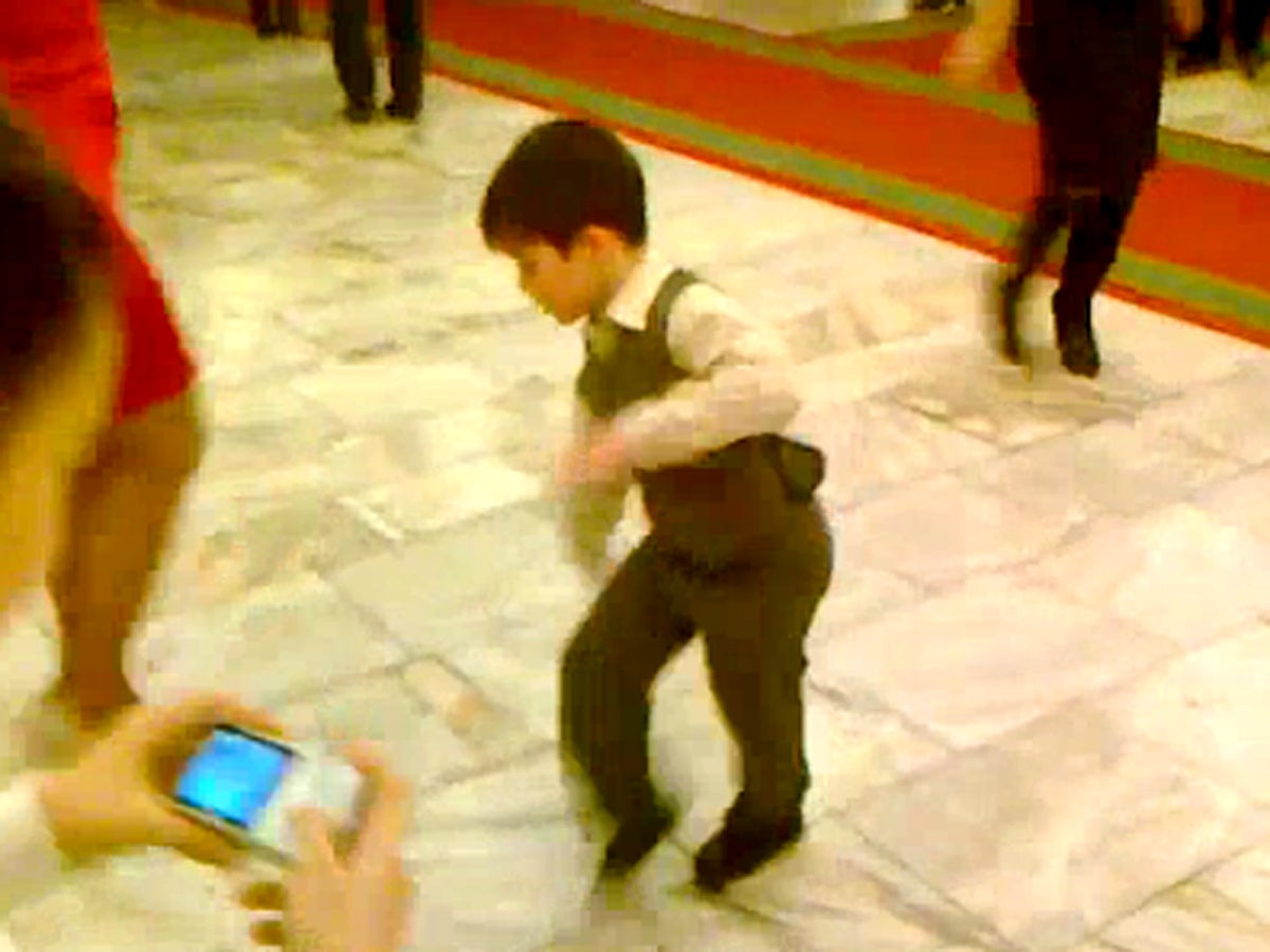 Watch this young boy just tear up the dance floor - CBS News
