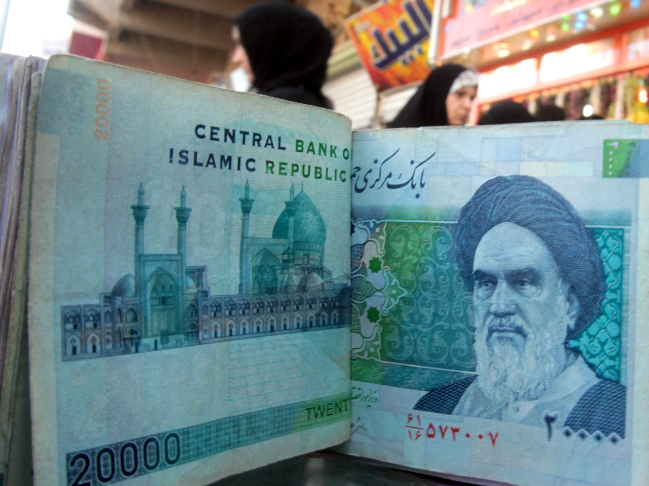 Global banking hub cuts ties with Iranian banks - CBS News