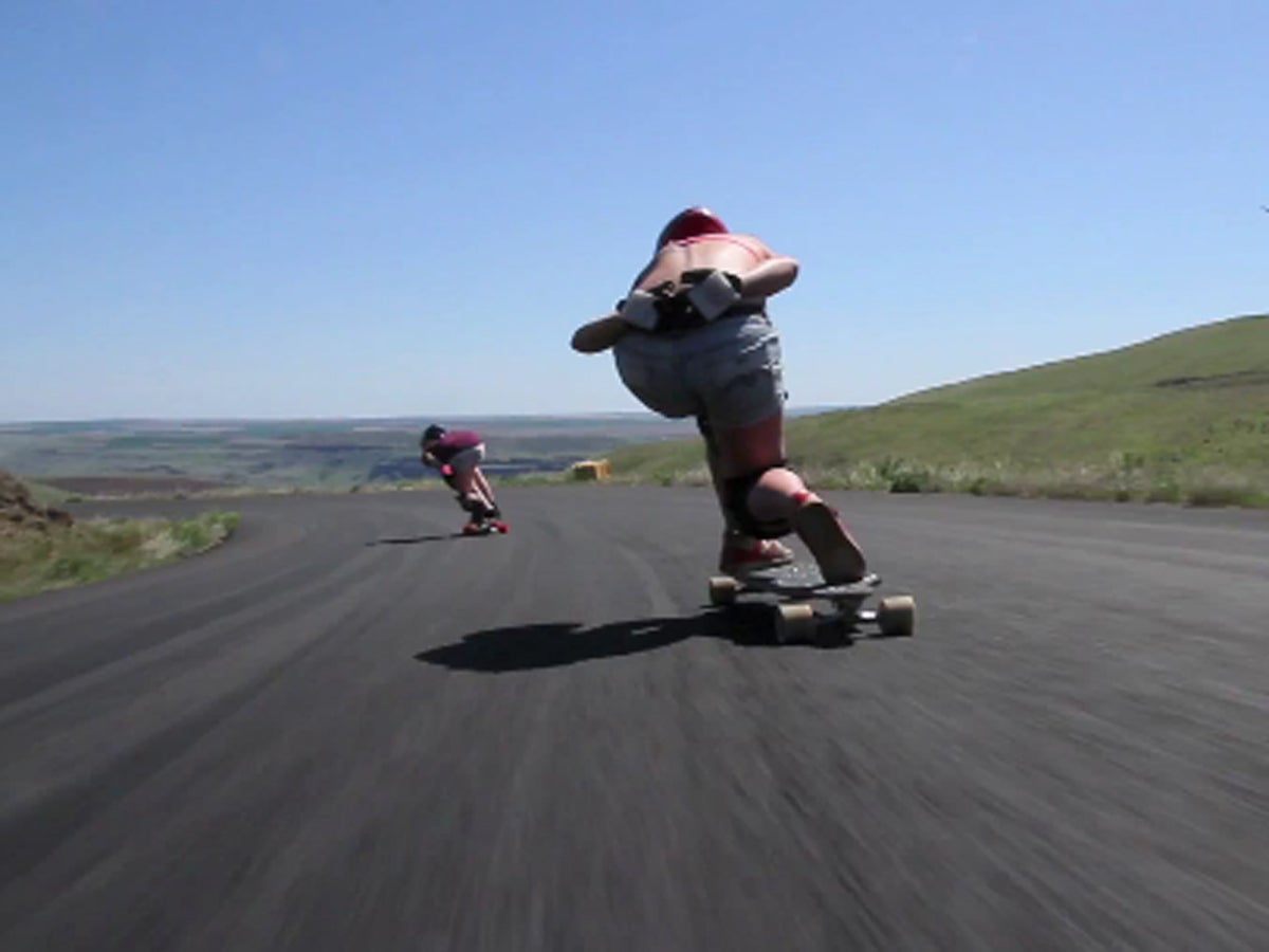 Freeriding longboards downhill at extreme speeds - CBS News