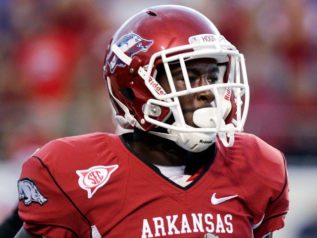3 Razorback football players charged with burglary - CBS News