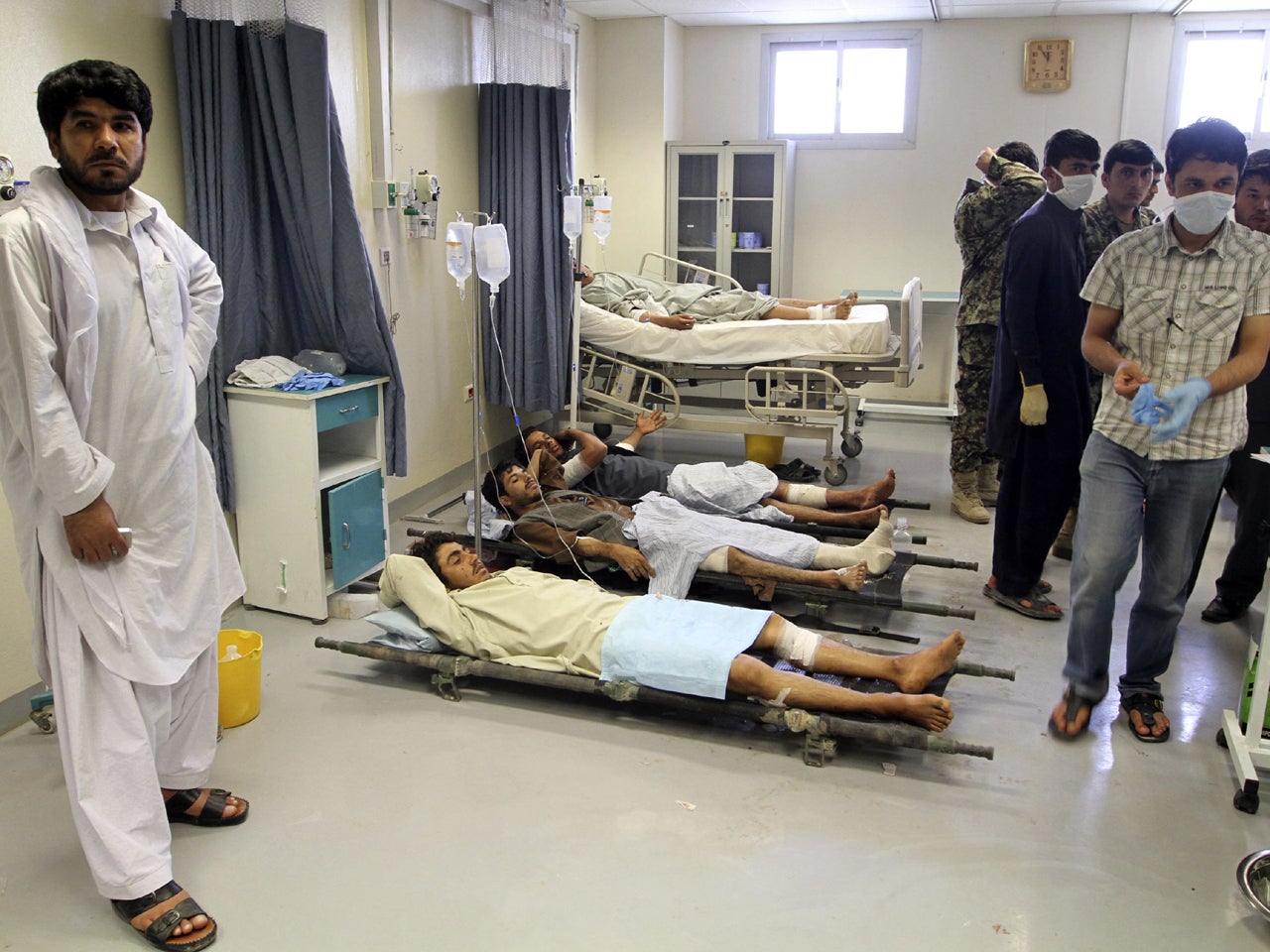 Afghanistan bomber kills 21 at market outside sprawling Kandahar ...