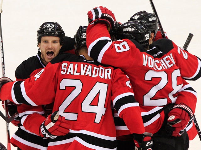 Devils stay alive, force Game 6 with 2-1 win - CBS News