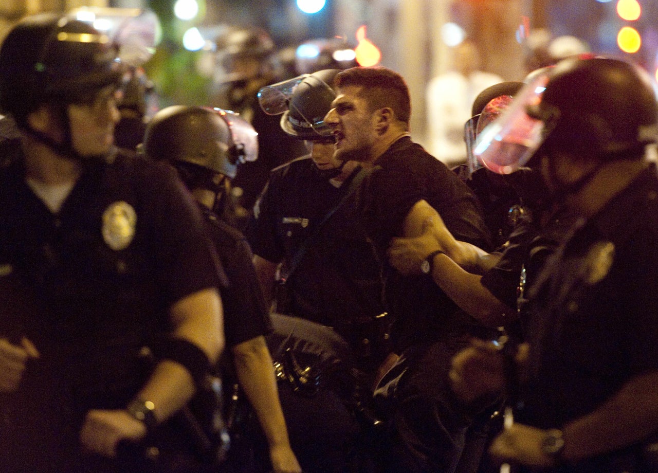 L.A. riot police clash with protesters near Art Walk - CBS News