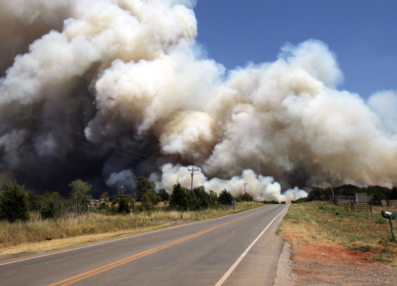 More than 100 buildings burn in Okla. wildfires - CBS News