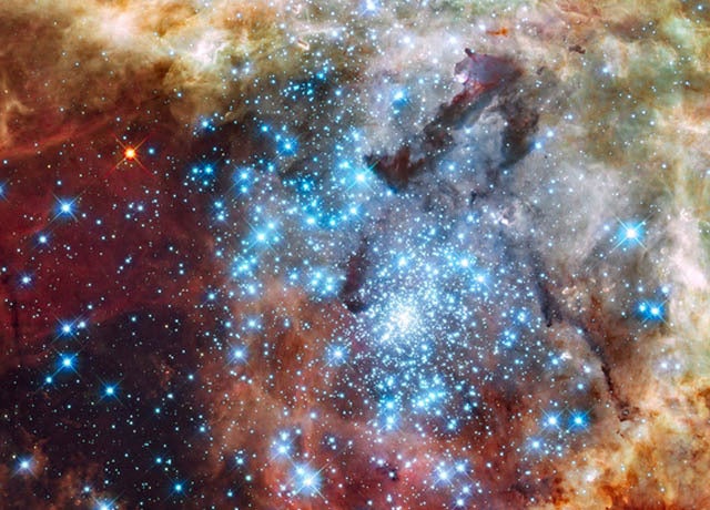 Stunning Hubble photo reveals colliding star clusters - CBS News