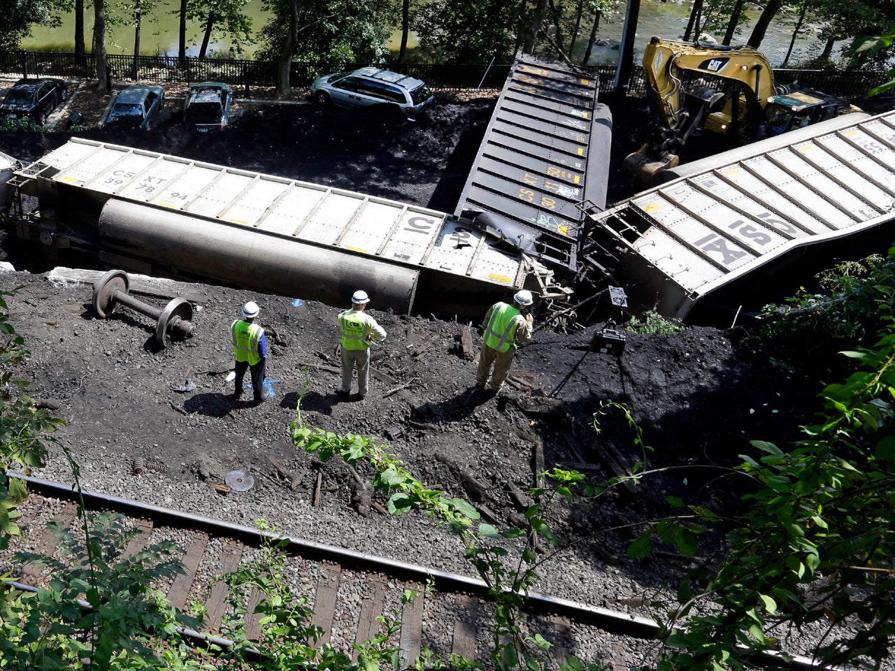 Train derailment's cause may take weeks to find - CBS News