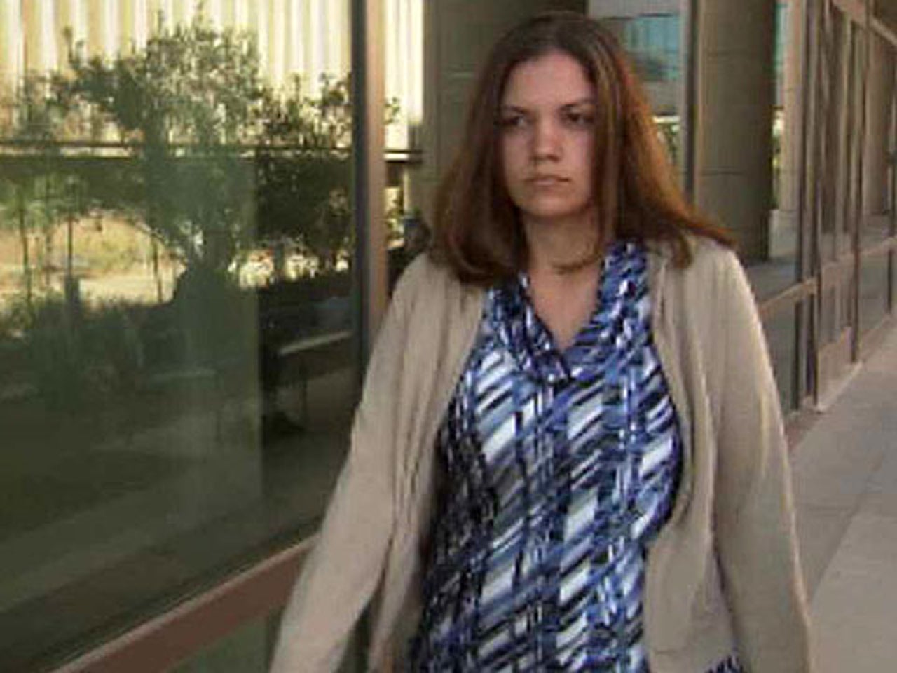 Woman jailed for faking cancer to get implants - CBS News