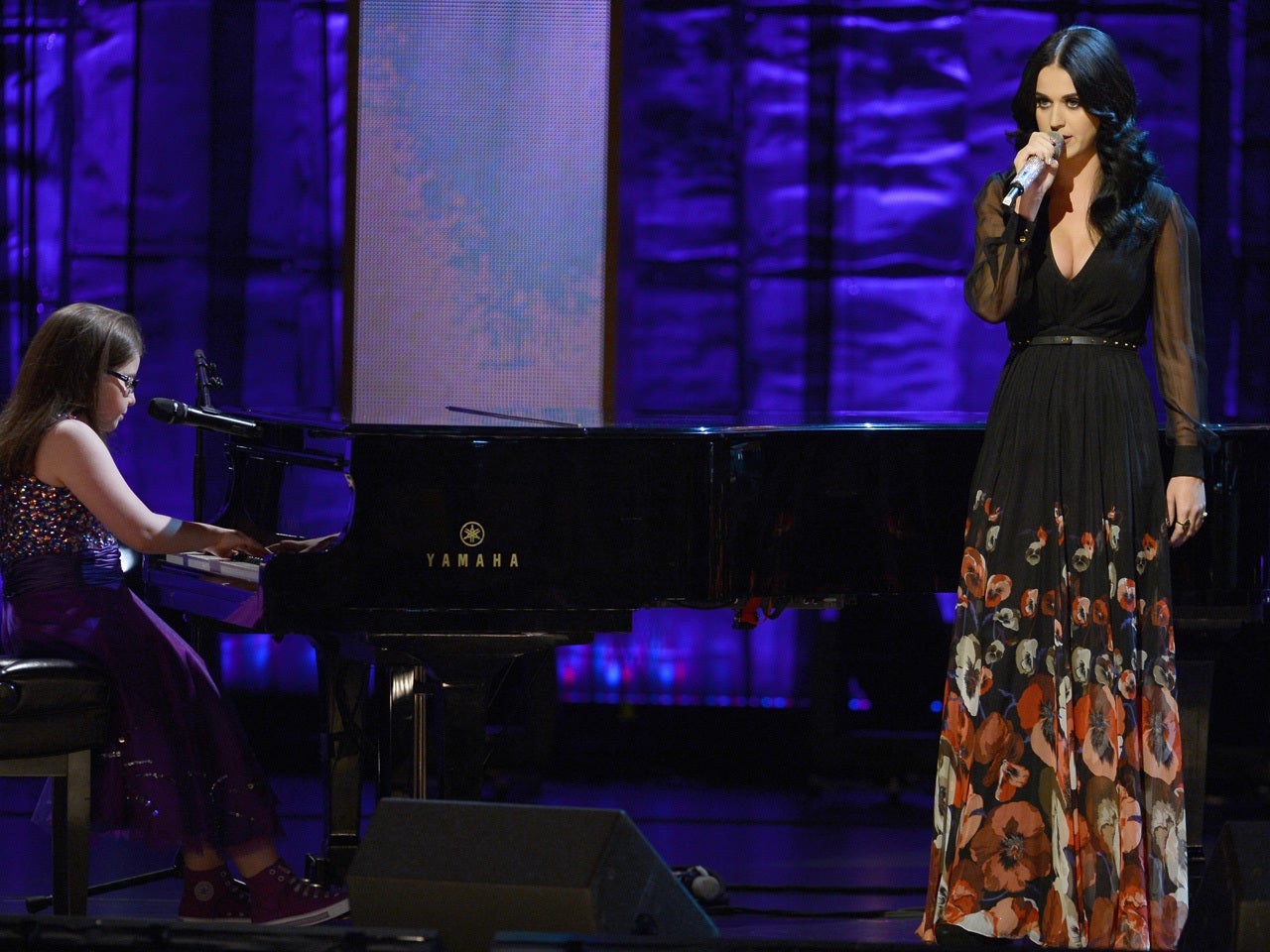 Katy Perry sings duet with 11-year-old with autism - CBS News