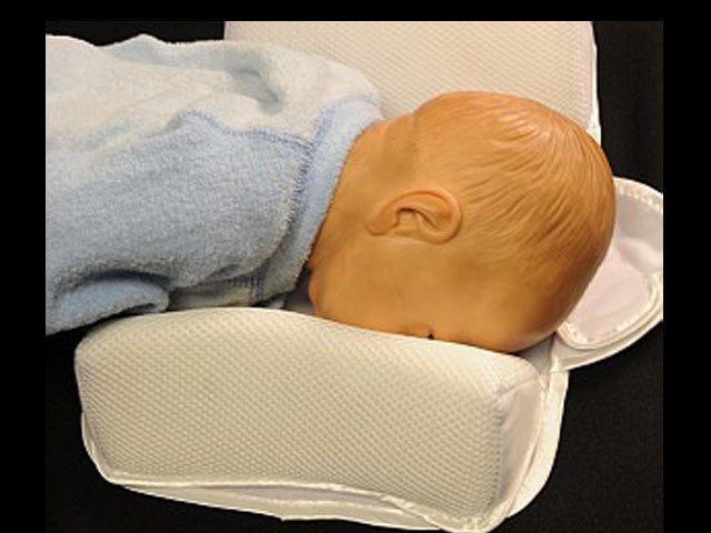 Renewed warnings of suffocation risk from infant sleep positioners ...