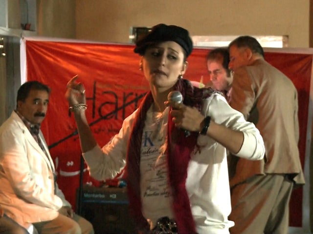 Afghan woman challenges convention through rap - CBS News