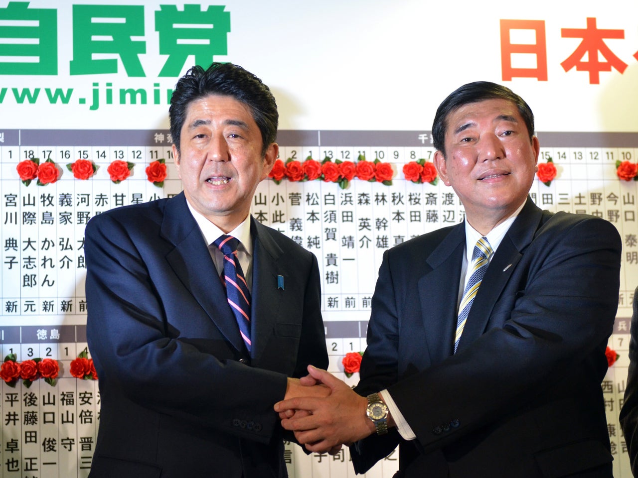 Japan's conservatives sweep back into power - CBS News