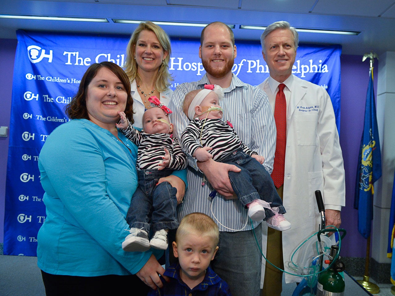 Previously conjoined twins Allison and Amelia make their public debut ...