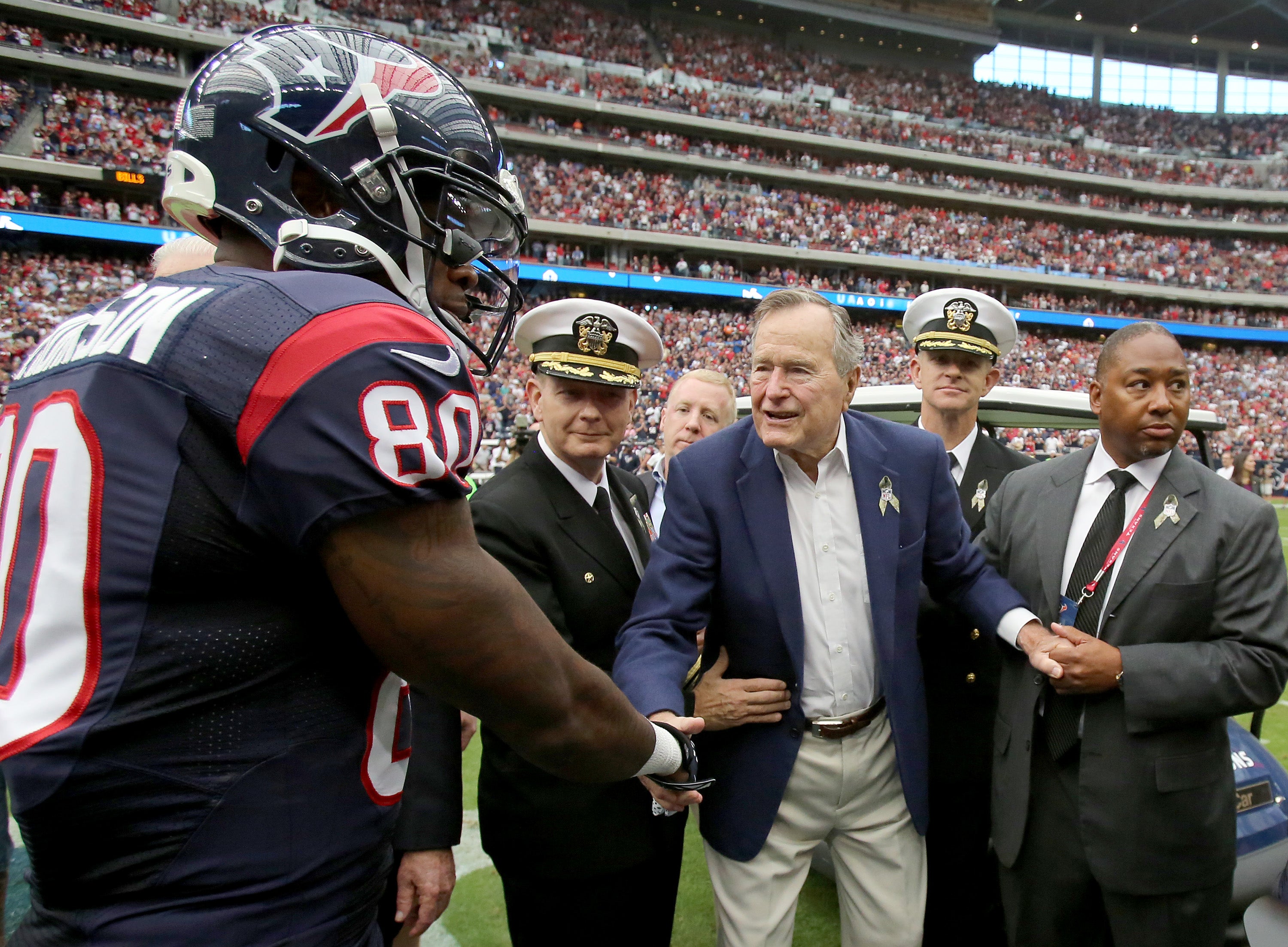 Fmr. President Bush still hospitalized, watching football - CBS News