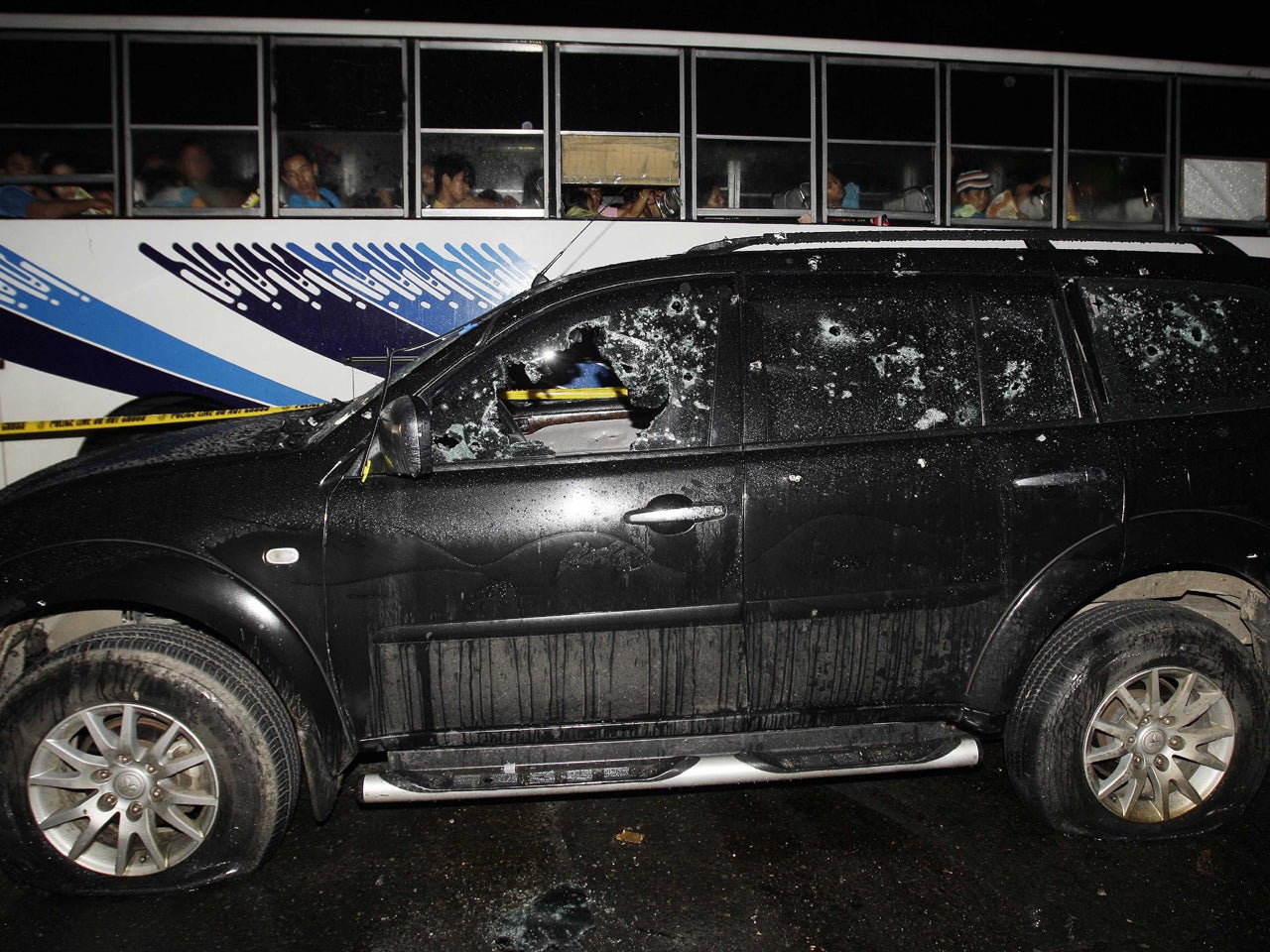 Philippine forces kill 13 suspects in gun battle - CBS News