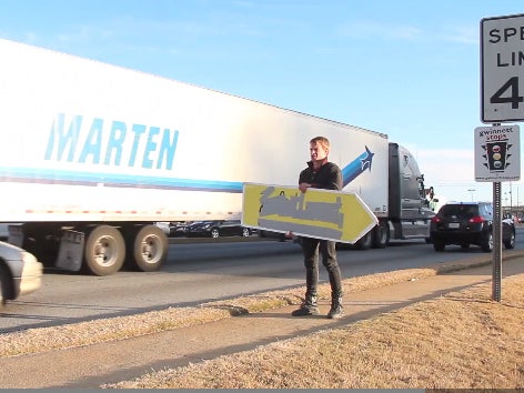 World's best sign flipper demonstrates his skills (with dancer Marquese ...