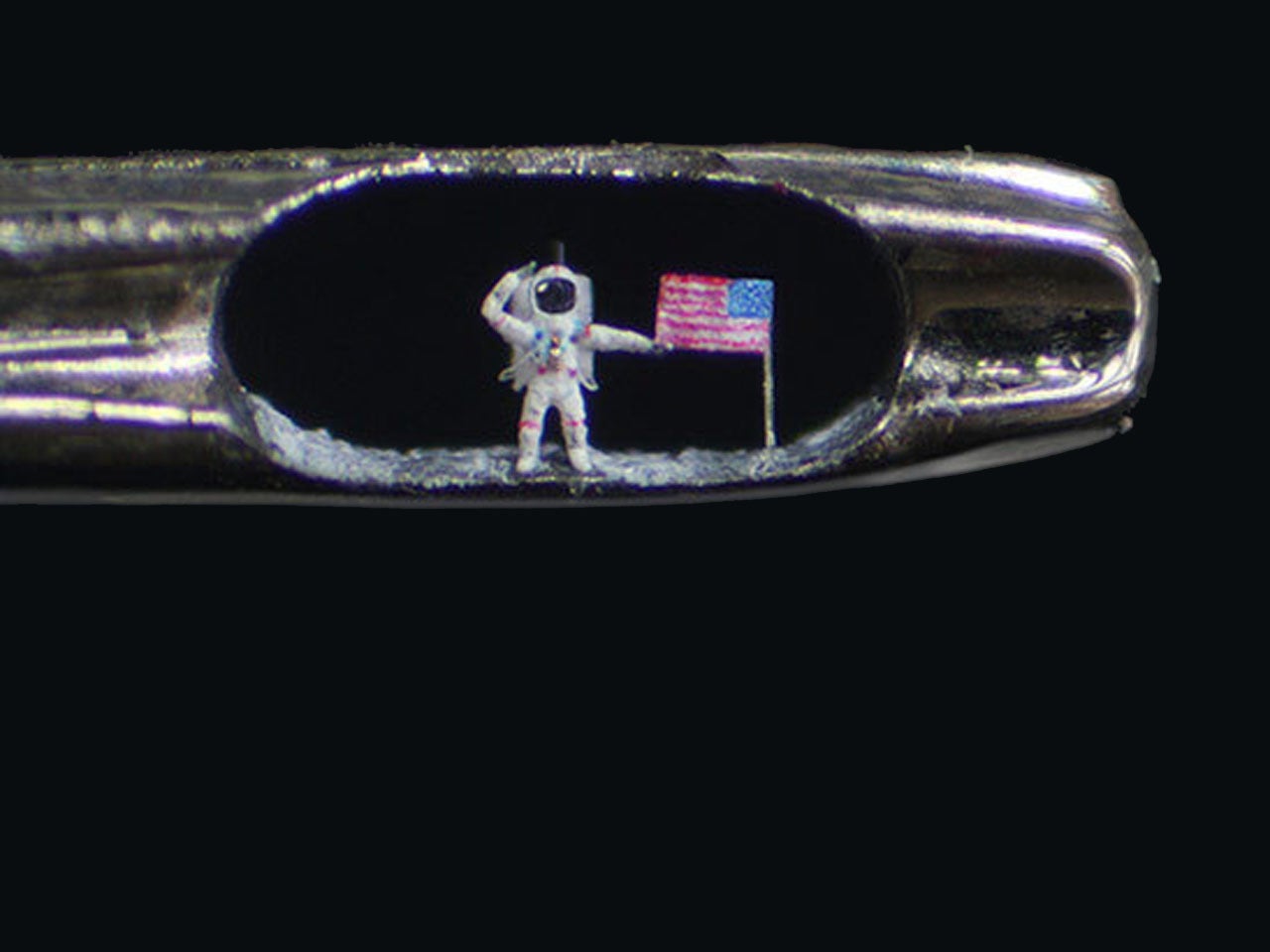 Tiny talent: Artist sculpts Buzz Aldrin in eye of needle - CBS News