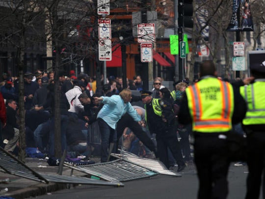 Boston Marathon Bombings: Surveillance video spies man on cellphone ...