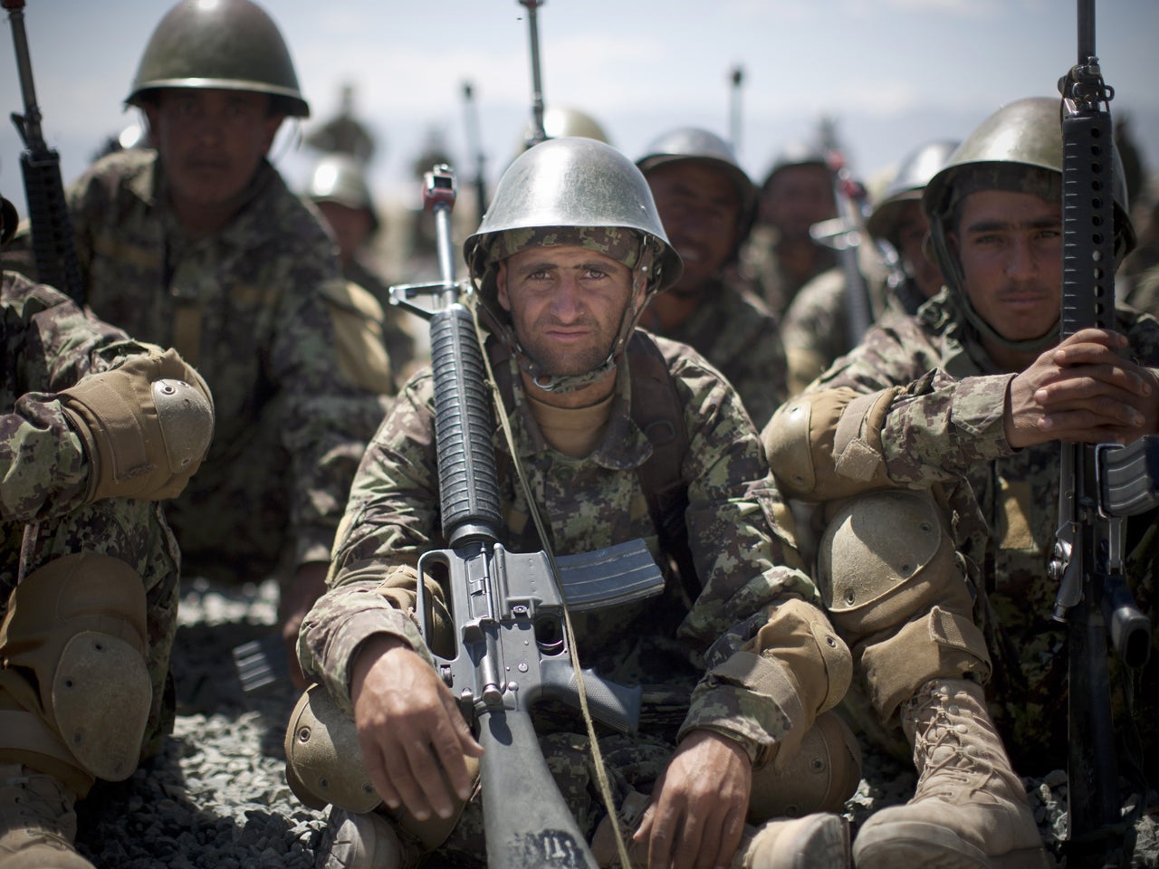 Afghanistan graveyard bomb blast kills 14 women and children - CBS News