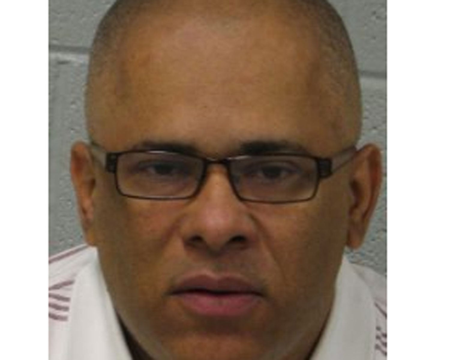 Head of Illinois anti-violence group charged with battering wife - CBS News