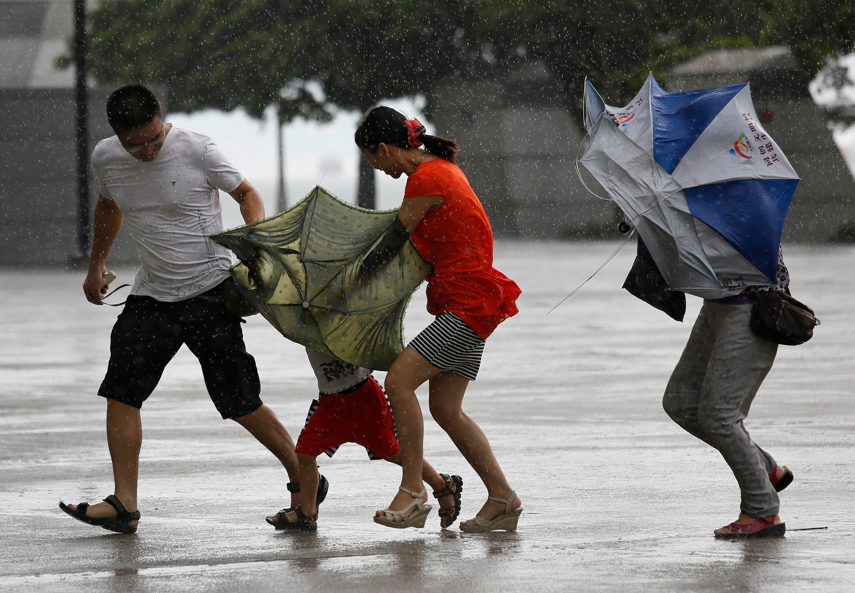 Typhoon Utor slams southern China, forces tens of thousands to evacuate ...