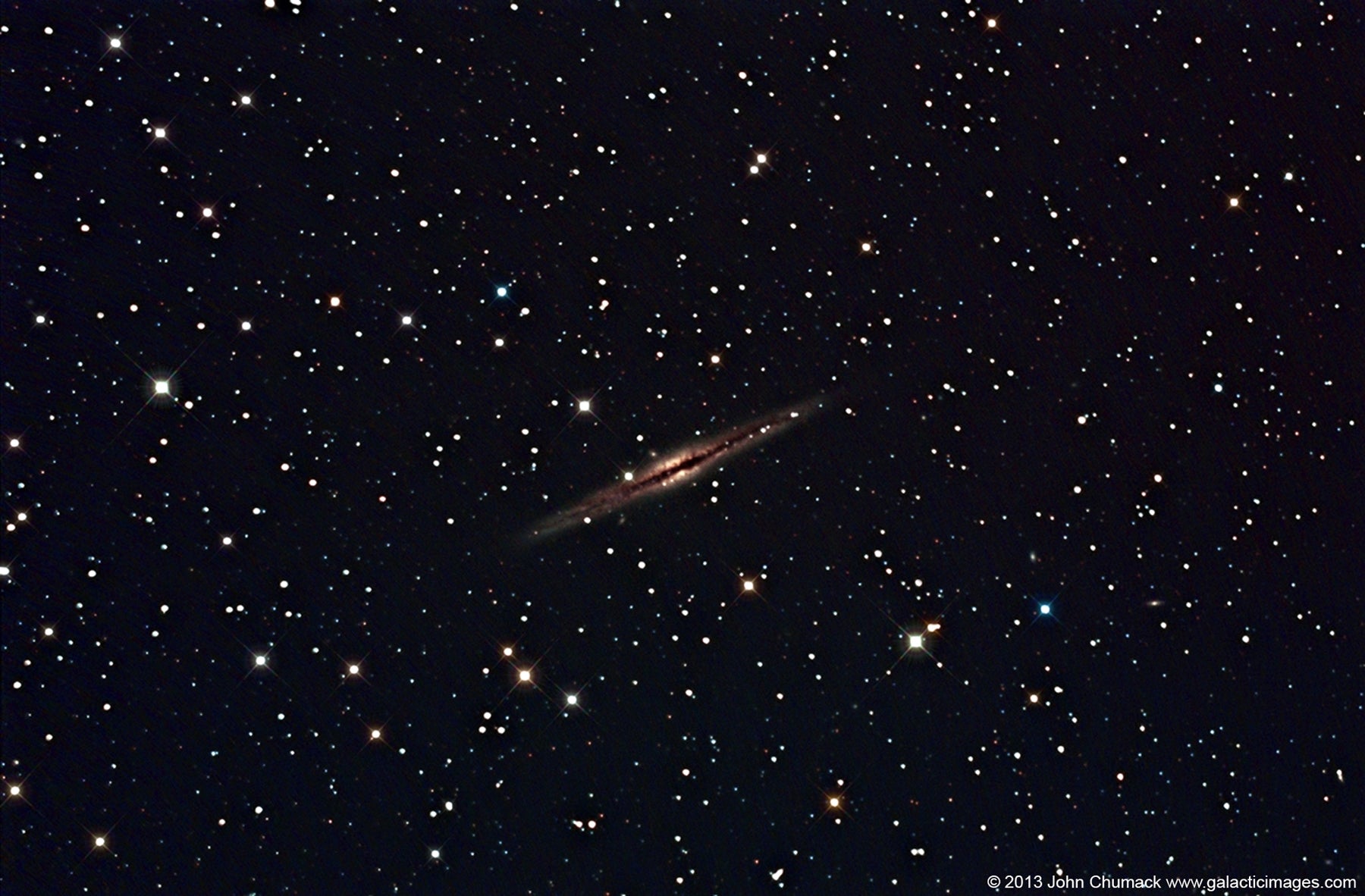 Stargazer captures stunning image of edge-on spiral galaxy - CBS News
