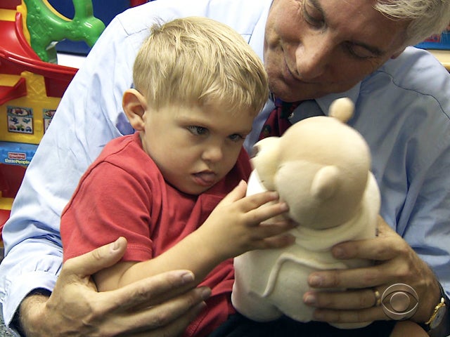 Little Grayson makes progress with auditory implant - CBS News
