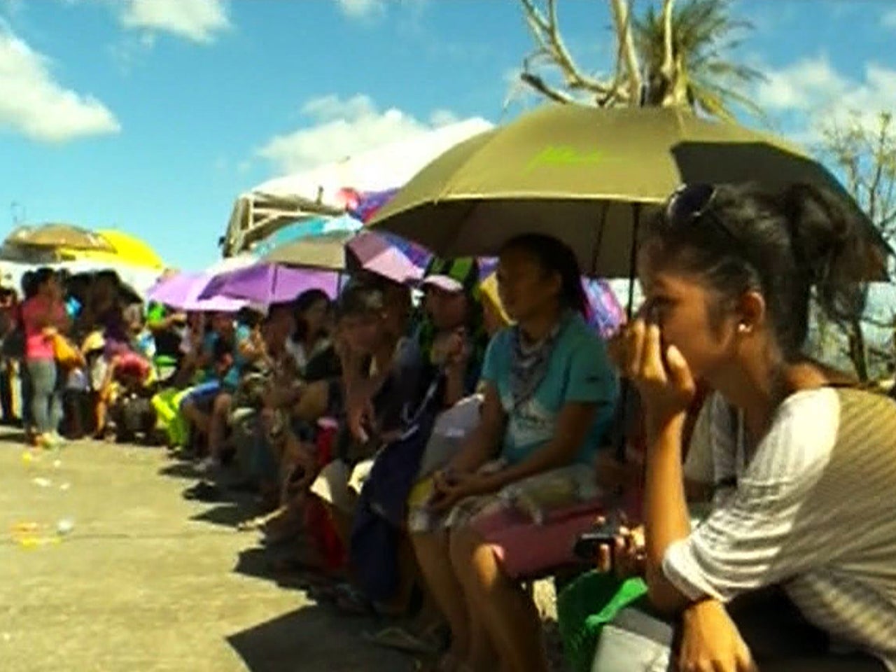 Philippines typhoon recovery: line after line in hard-hit Tacloban ...
