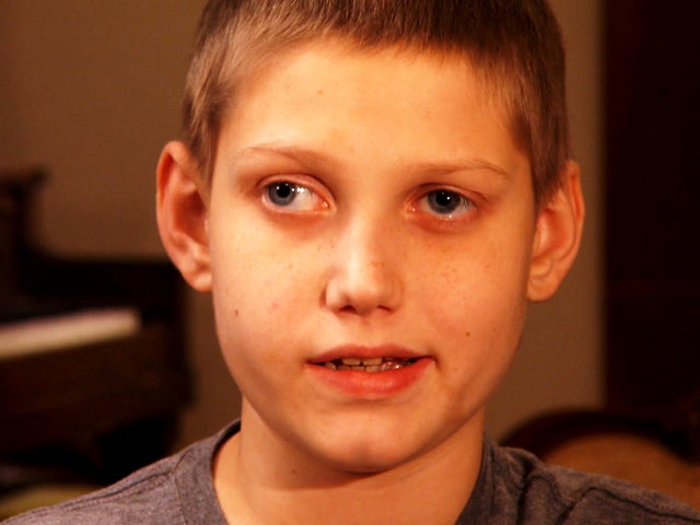 Young Ohio State fan beats cancer after calling it "Michigan" - CBS News