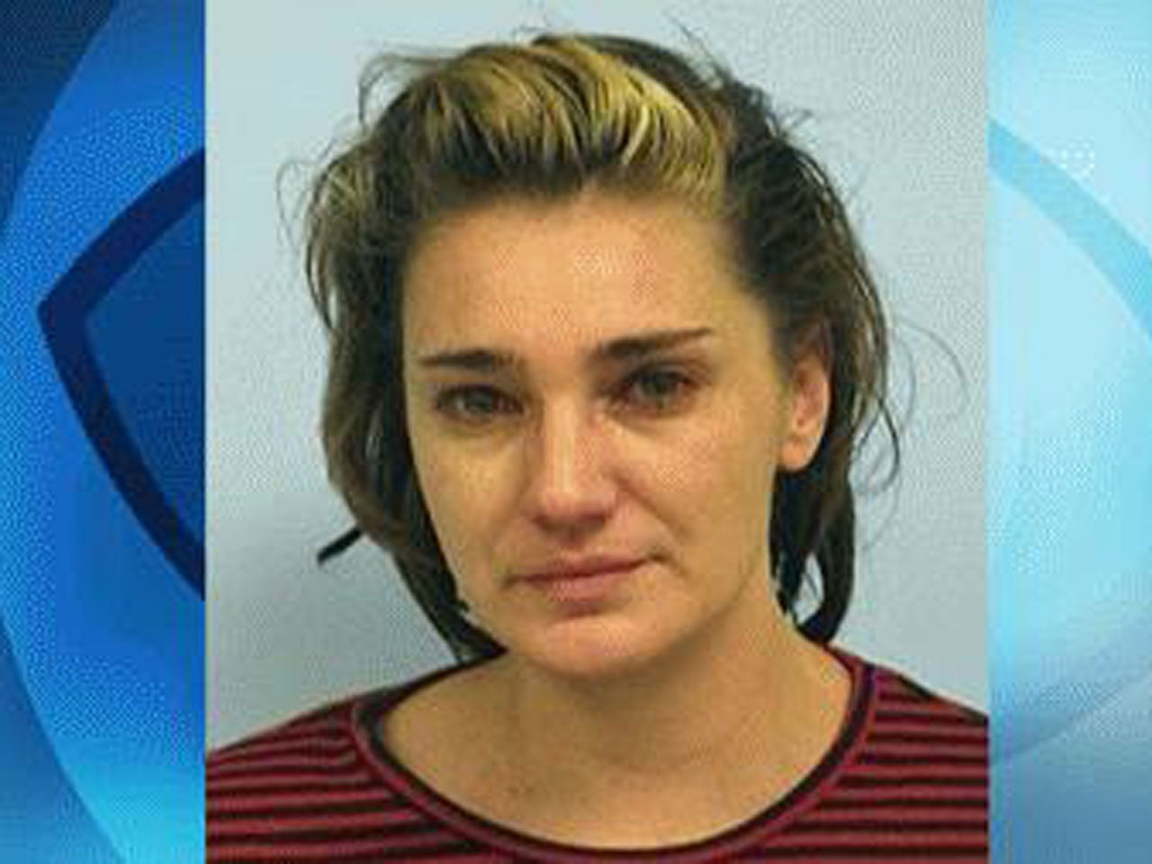 Woman arrested for allegedly vandalizing famous Austin mural - CBS News