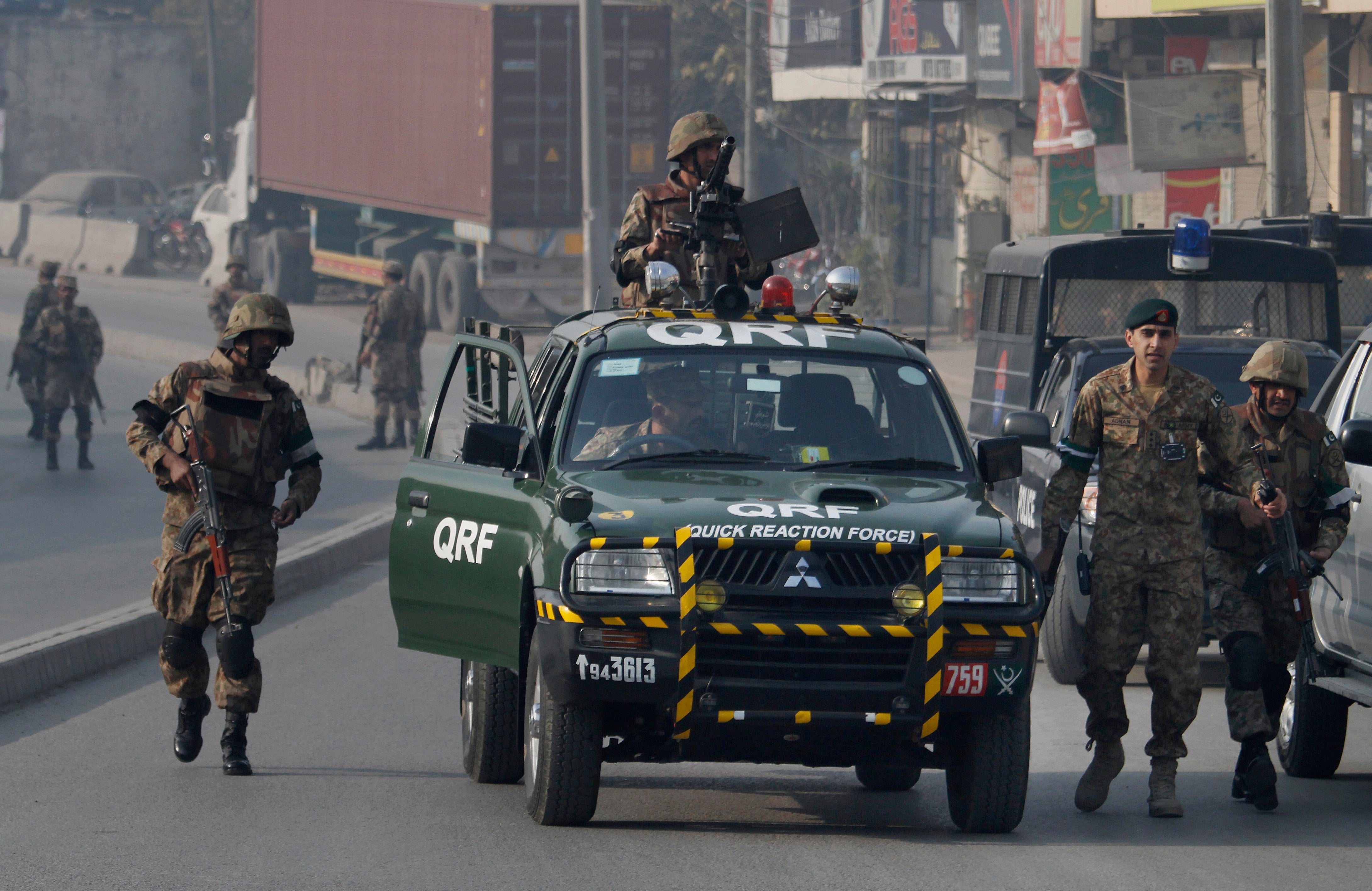 Taliban suicide bomber kills 13 near Pakistan military headquarters ...