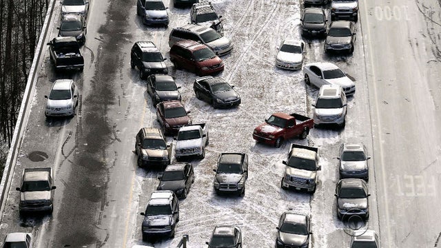 Road to nowhere: Minor snowstorm brings Atlanta to standstill - CBS News