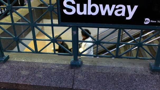Man is run over by NYC subway train but walks away unhurt - CBS News