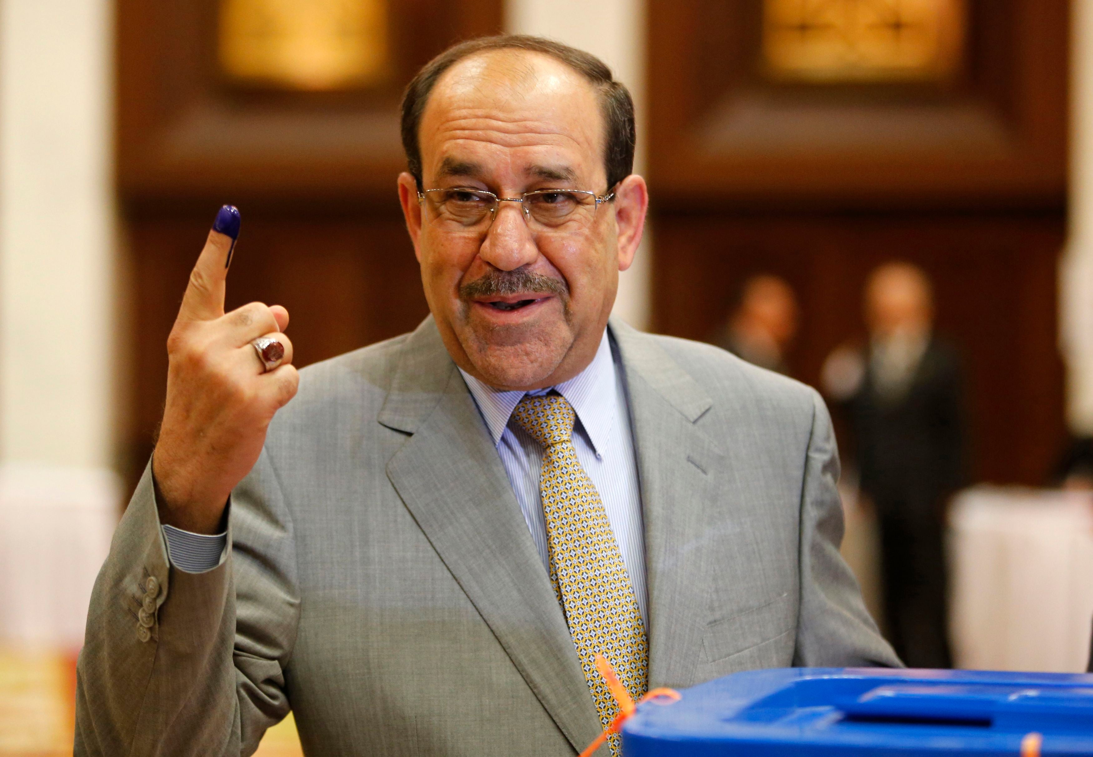 Iraq's al-Maliki gives up prime minister post to rival - CBS News