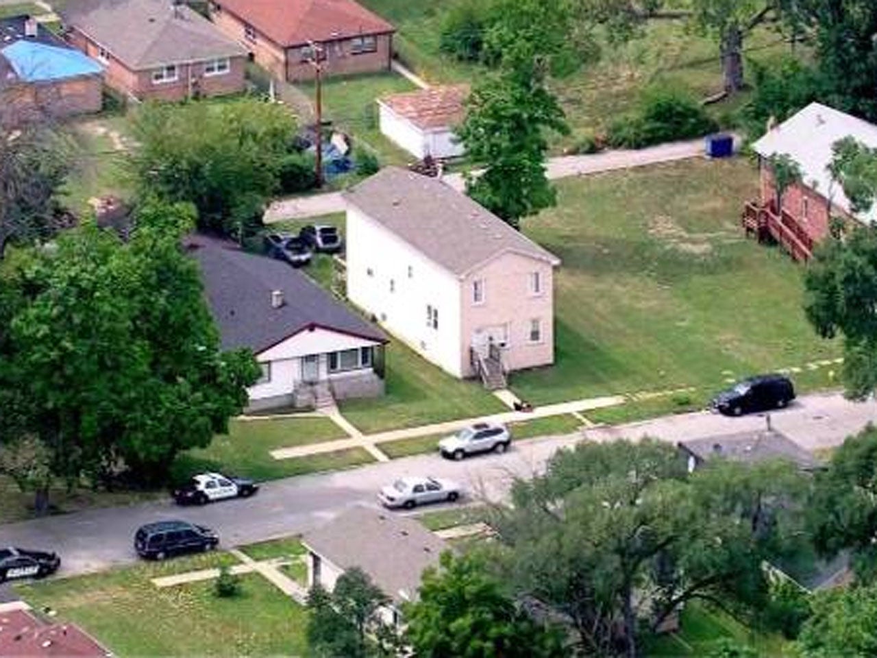 Standoff continues: Hostages still being held in suburban Chicago home ...