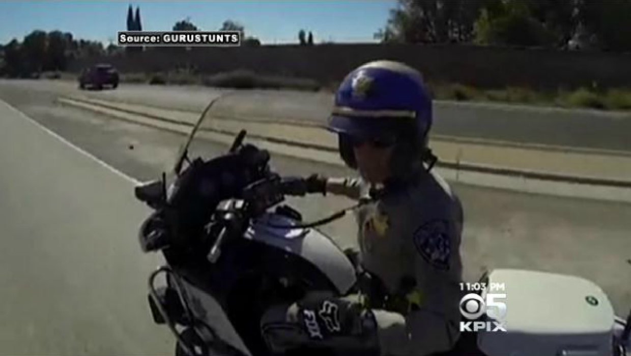 VIDEO: Bikers popping wheelies shoo-away California cop - CBS News