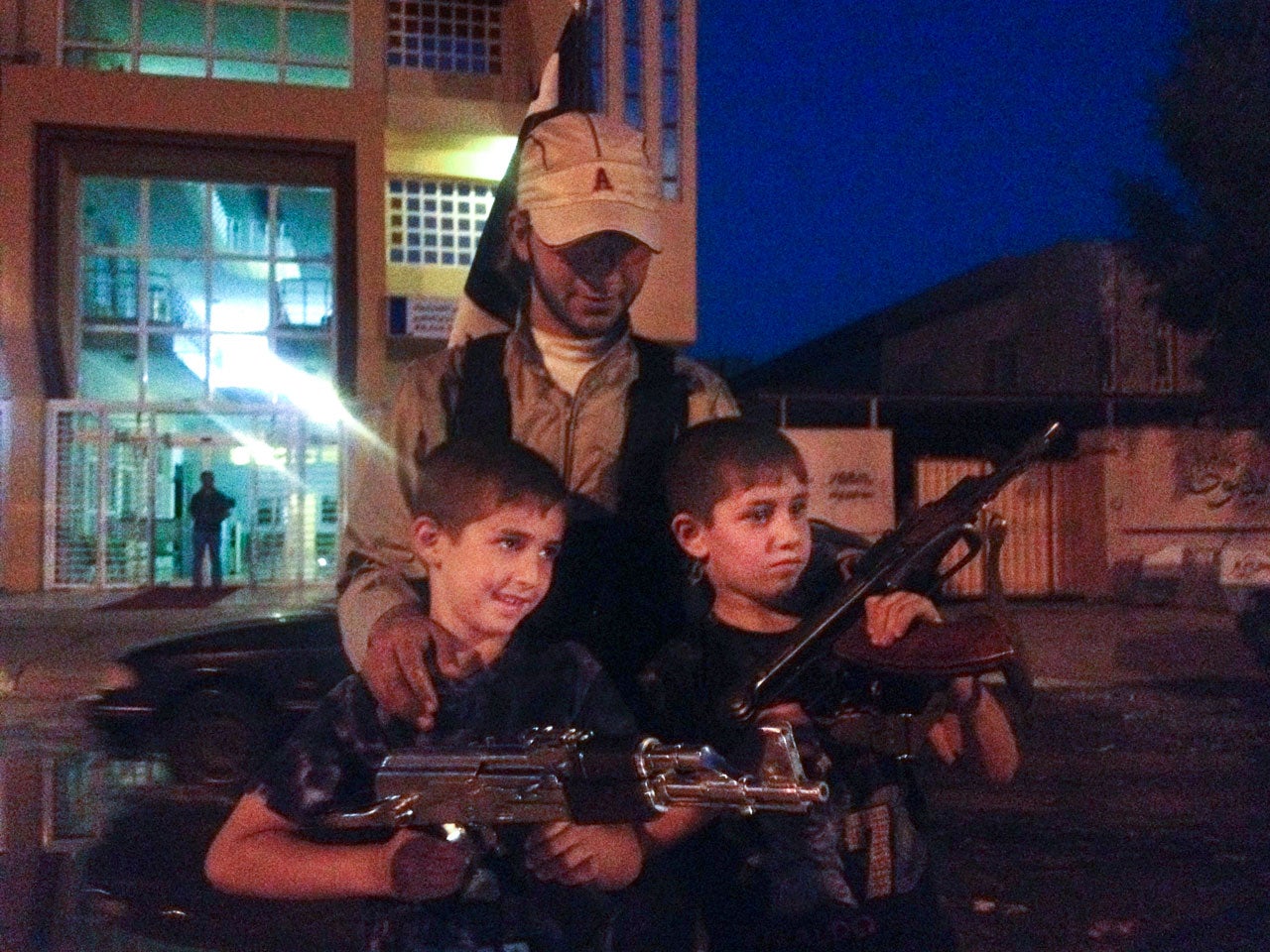 Child soldiers become integral part of ISIS' army - CBS News