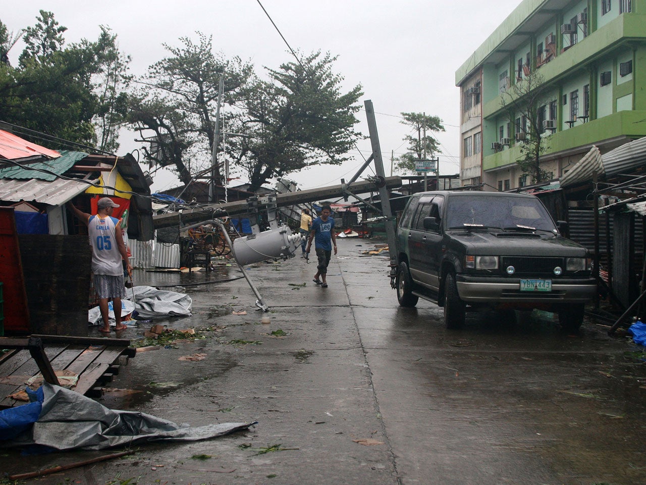 Typhoon Hagupit kills three but leaves minimal property damage - CBS News