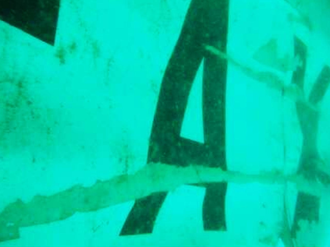 Tail of missing AirAsia jetliner found in Java Sea - CBS News