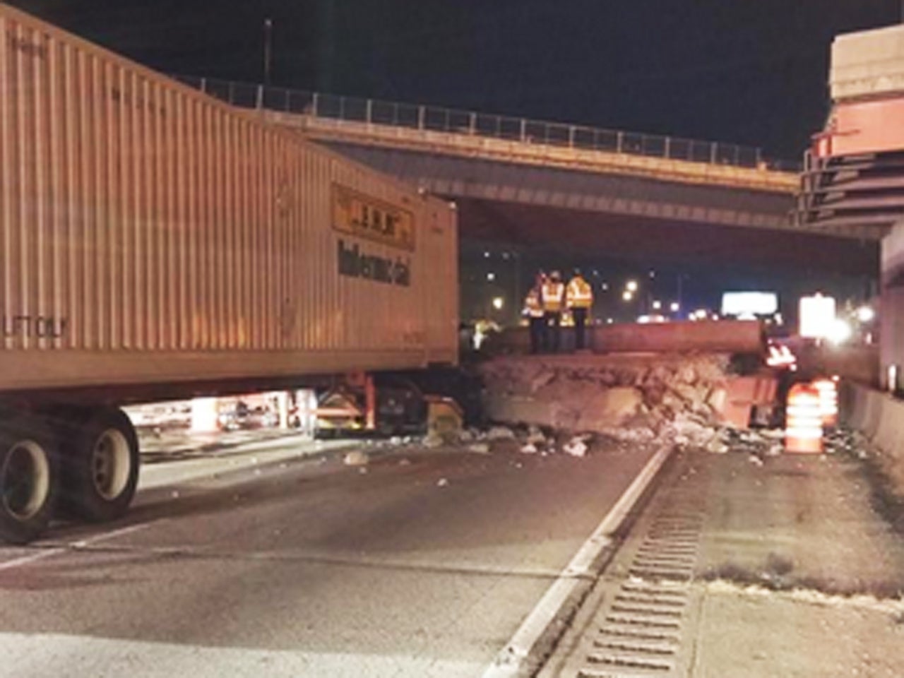 Police: 1 dead, 1 injured in highway overpass collapse - CBS News