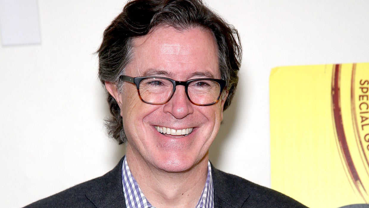 Auction of Stephen Colbert's desk helps raise $800K for schools - CBS News