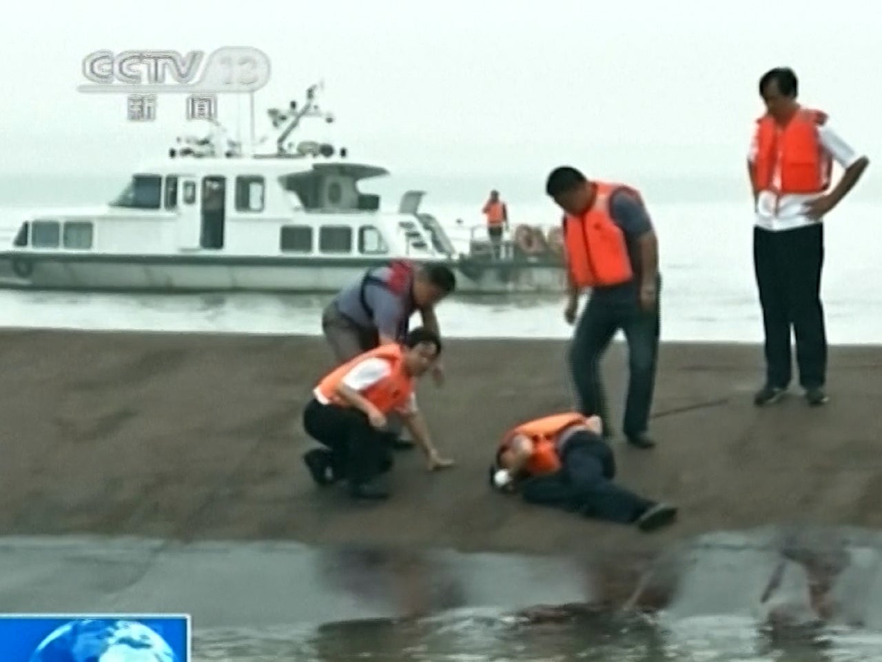 Disaster on Chinese river as cruise ship flips over - CBS News