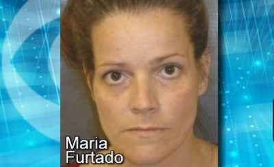 Mother accused of instructing son to shoot neighbor's puppy - CBS News