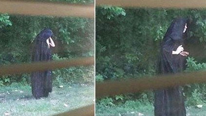 Police investigating after images of cloaked figure go viral - CBS News