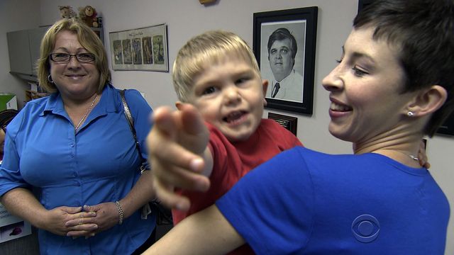 Little Grayson makes progress with auditory implant - CBS News