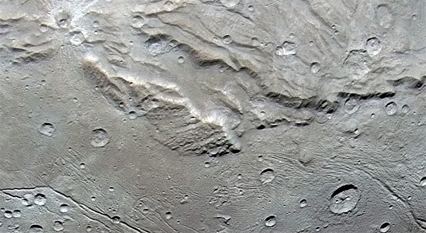 New views of Pluto's moon Charon show violent past - CBS News