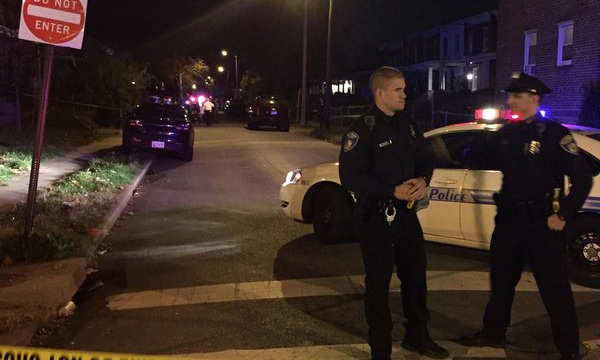 Police: Officer wounded, suspect killed in Baltimore shooting - CBS News