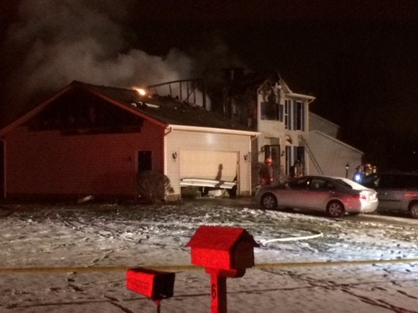 Ohio house explosion, fire kill family of 4 - CBS News
