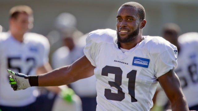 Police called on NFL player Kam Chancellor, who looked into gym - CBS News